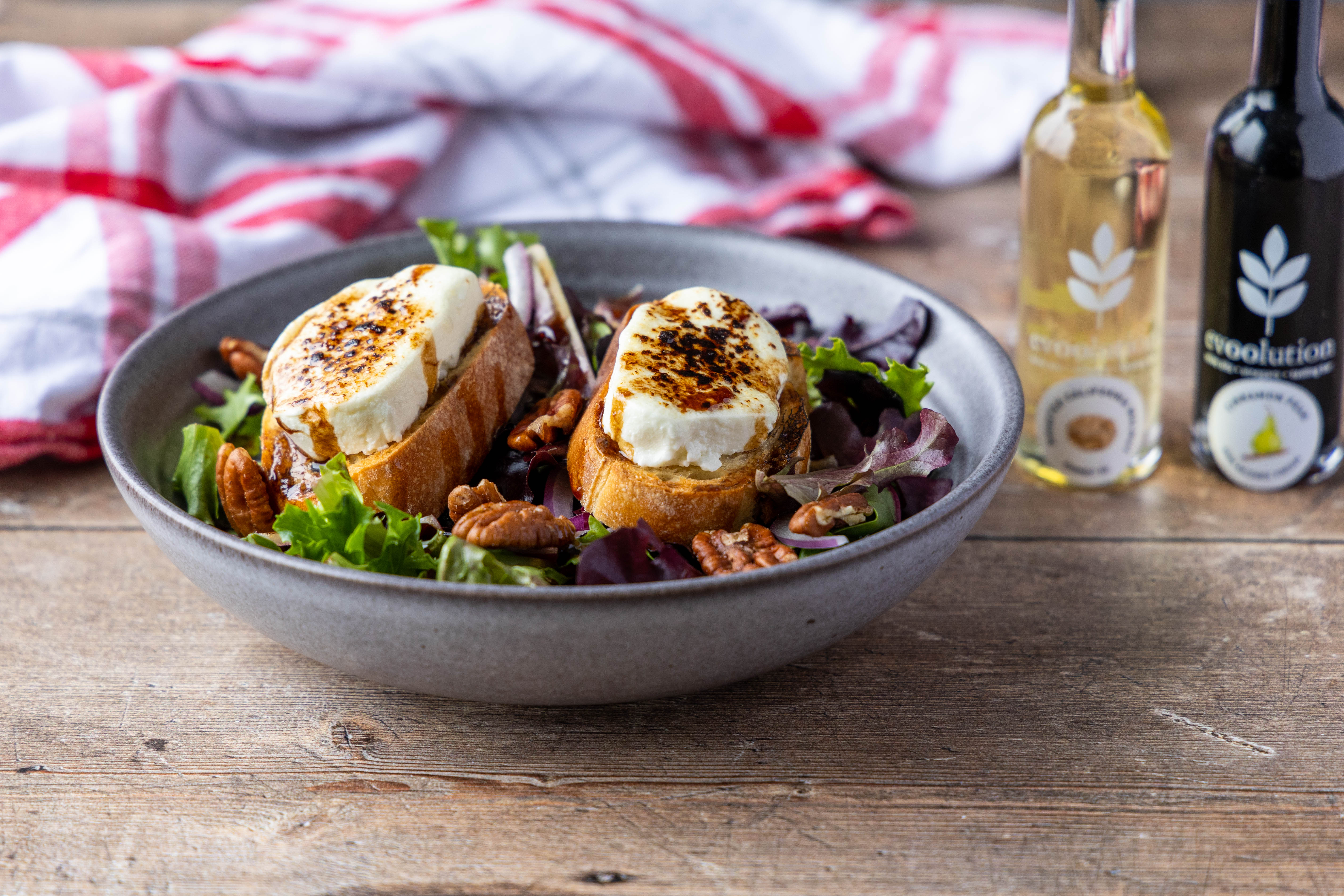 Chèvre Chaud Salad with Walnut Oil and Cinnamon Pear Balsamic – Evoolution